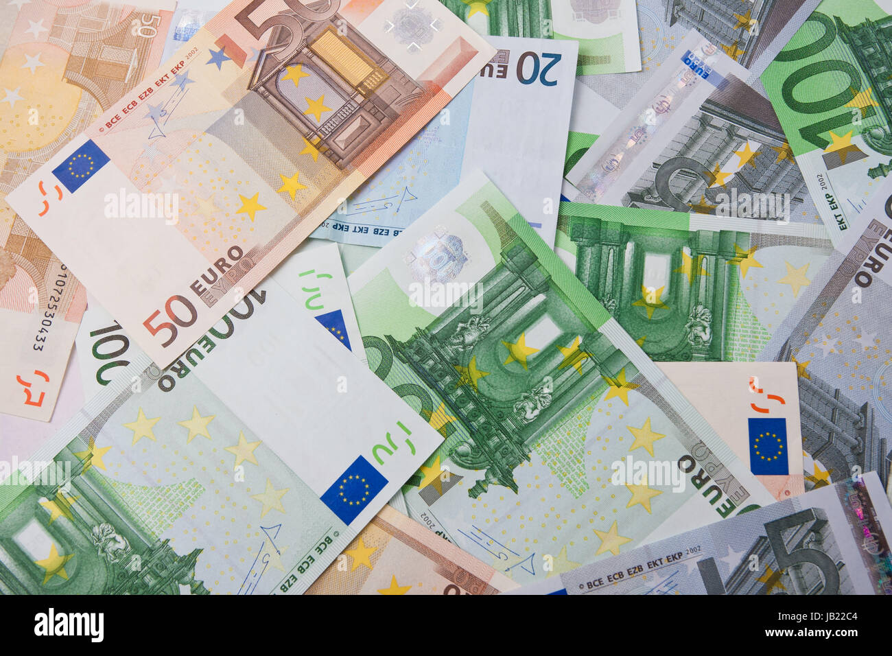 Many euro banknotes making european currency background Stock Photo - Alamy