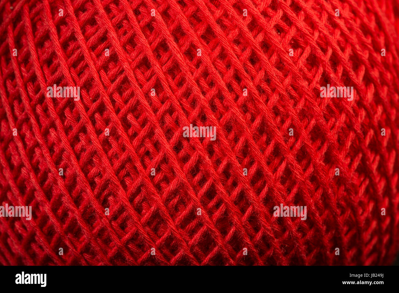 Red yarn close up background Stock Photo - Alamy