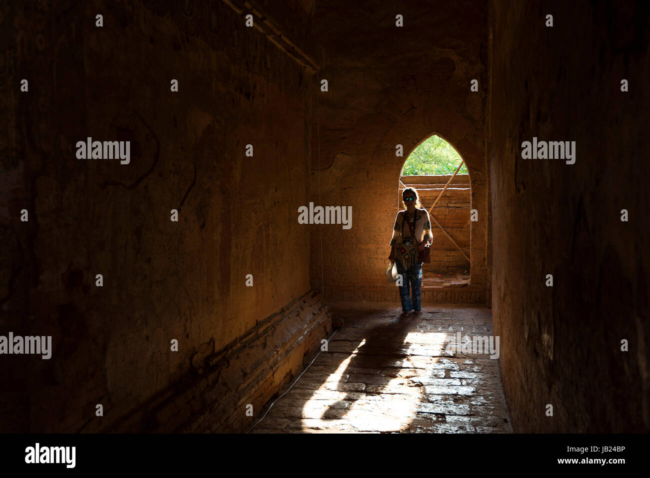Woman inside Dhammayangyi Pagoda, an ancient temple in Bagan, Myanmar ...