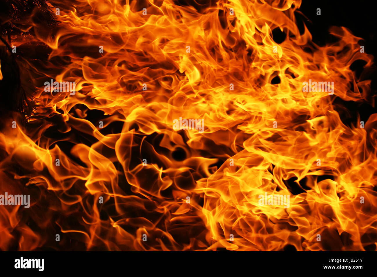 Beautiful yellow and orange hot fire on black background Stock Photo ...