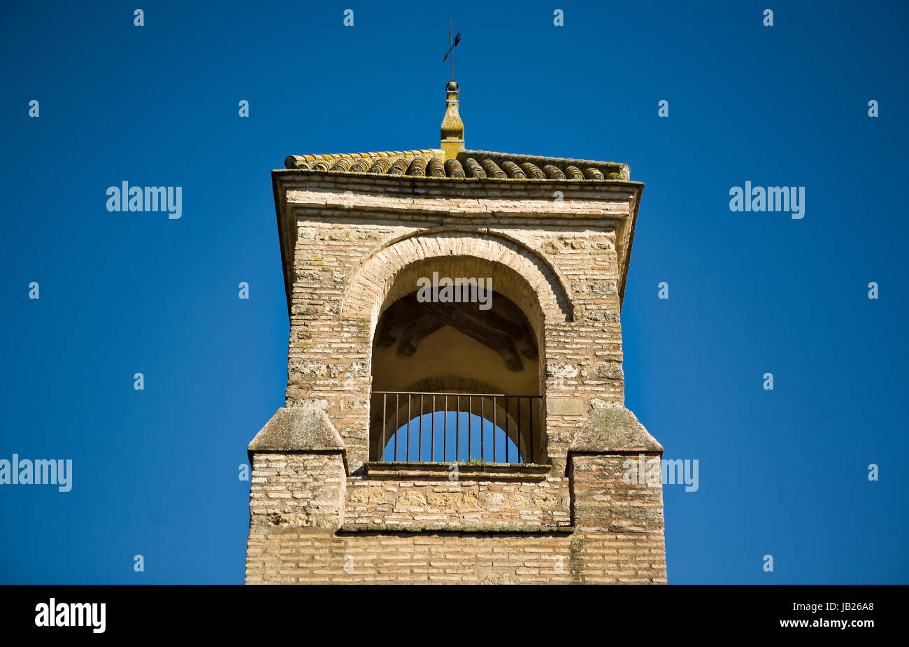 Red brick belfry over blue sky, Cordoba, Spain Stock Photo - Alamy