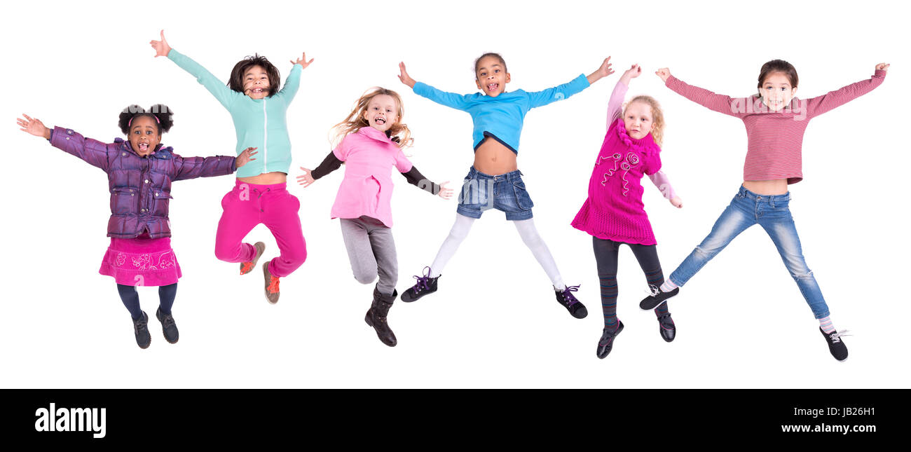 Group of young girls jumpng isolated in white Stock Photo - Alamy