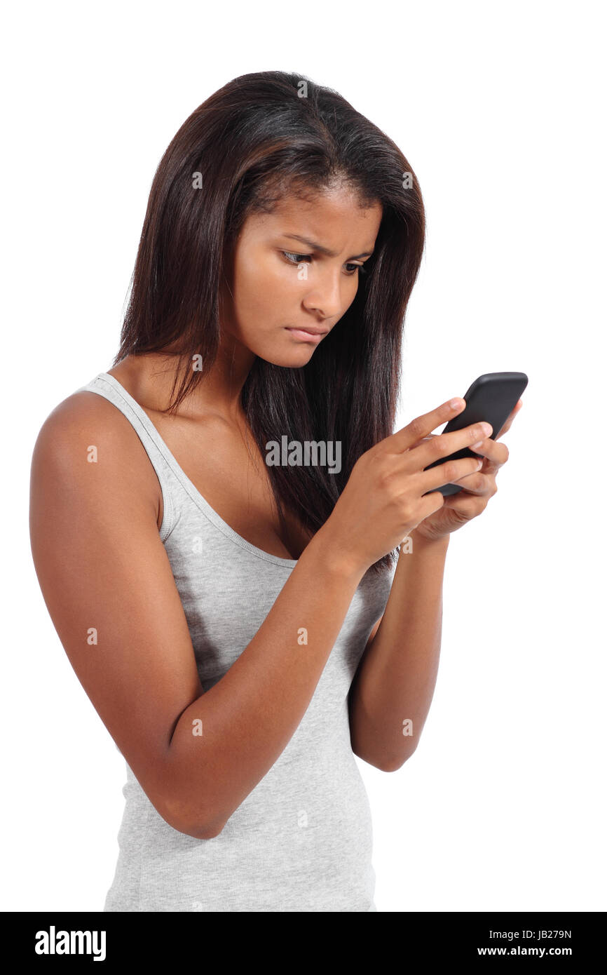 Beautiful african american serious model woman browsing her smart phone ...