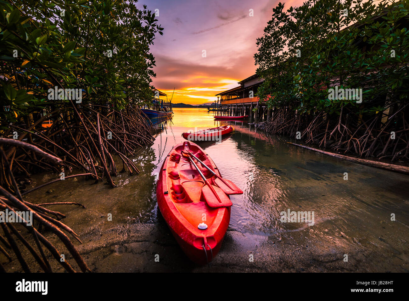 Red sea kayaks in the evening,in thailand Stock Photo - Alamy