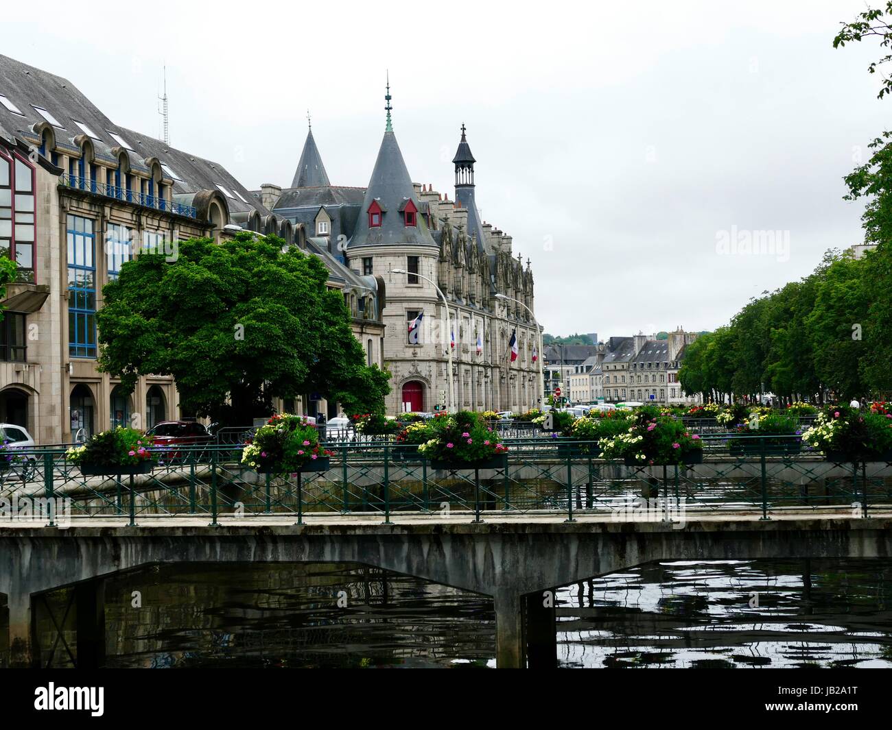 Pedestrian bridges over the Odet River with the Prefecture du Finistère ...