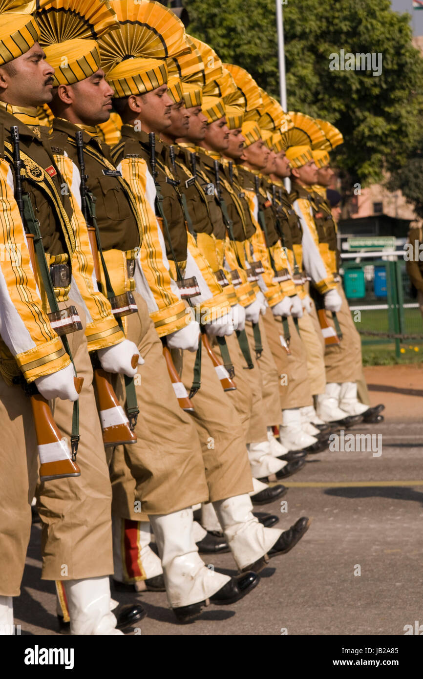 Soldiers in bright yellow trimmed uniform parading down the Raj Path in ...