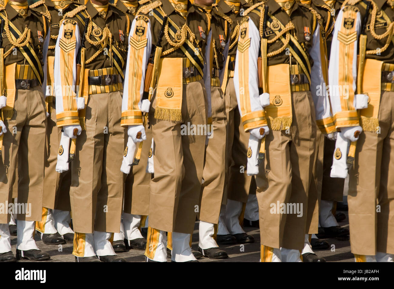 Soldiers in bright yellow trimmed uniform parading down the Raj Path in ...