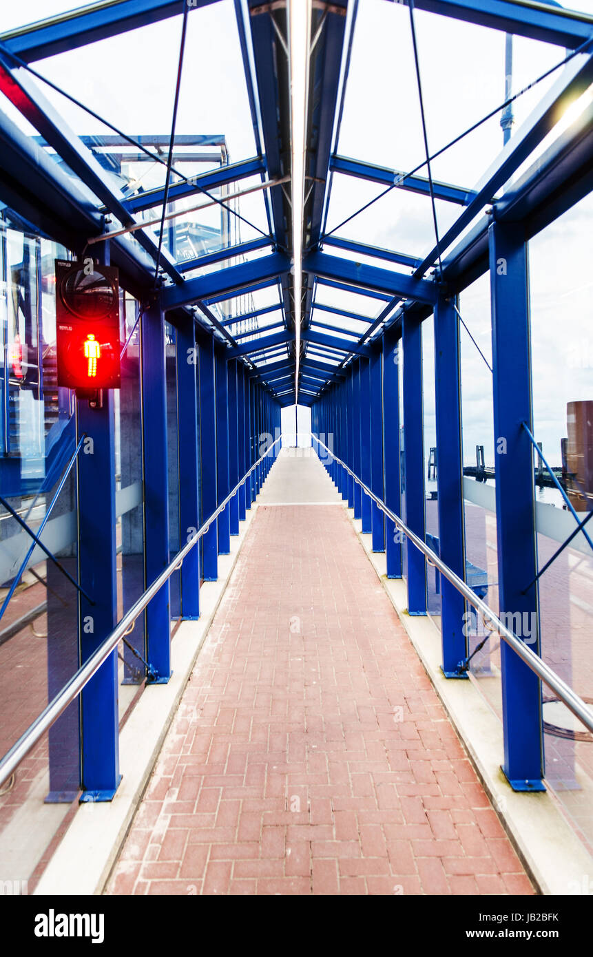 blue staircase with a red traffic light Stock Photo - Alamy