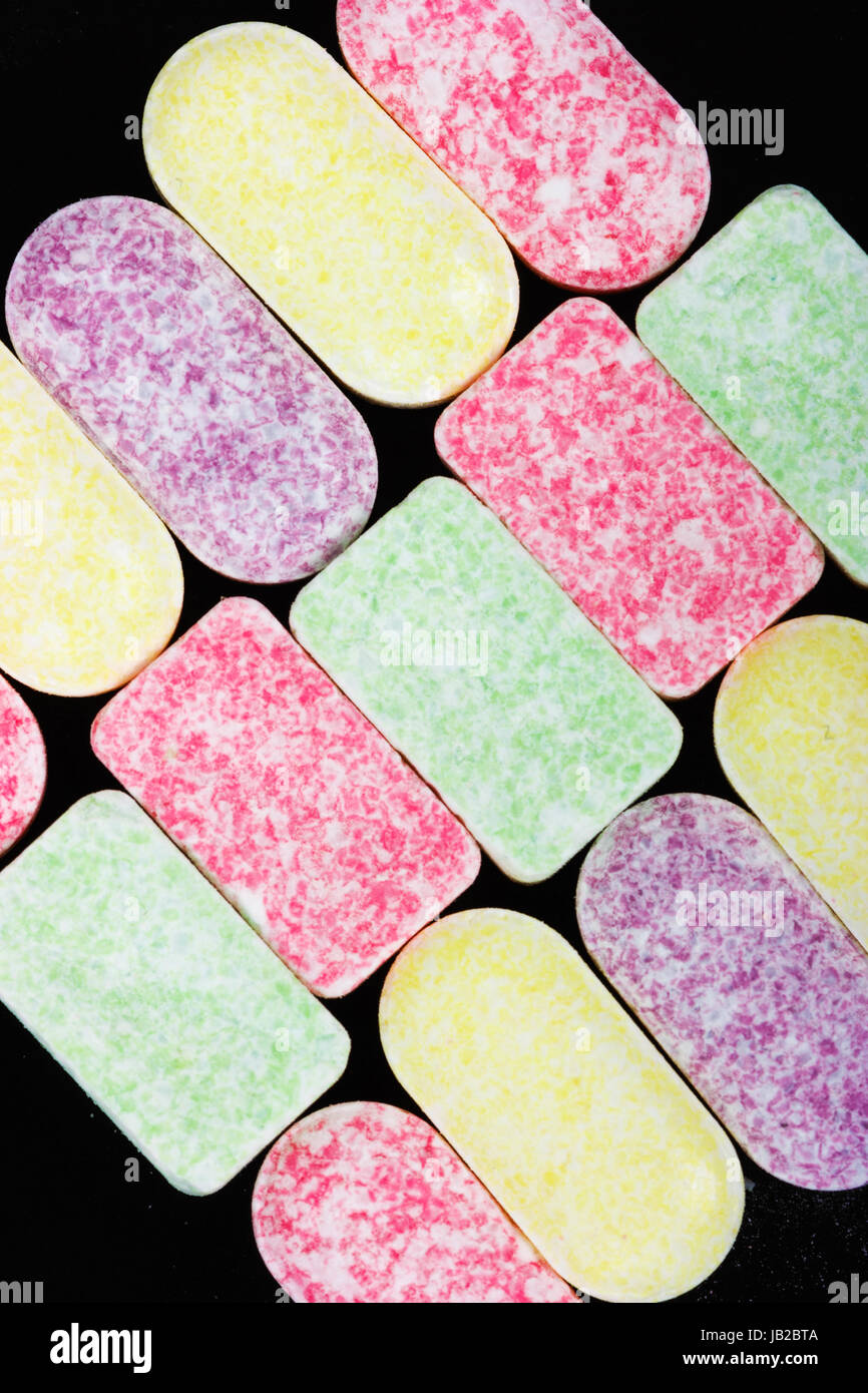 colorful rectangular candy on a black background Stock Photo - Alamy