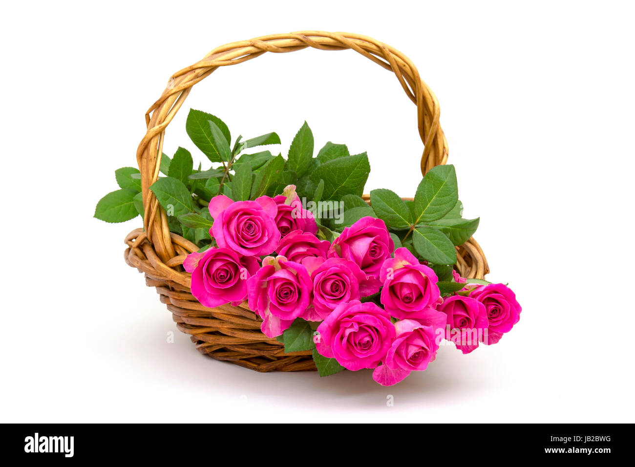 pink roses in a basket Stock Photo - Alamy