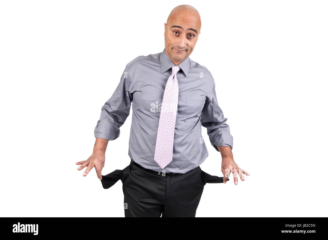 Man showing empty pockets isolated in white Stock Photo - Alamy