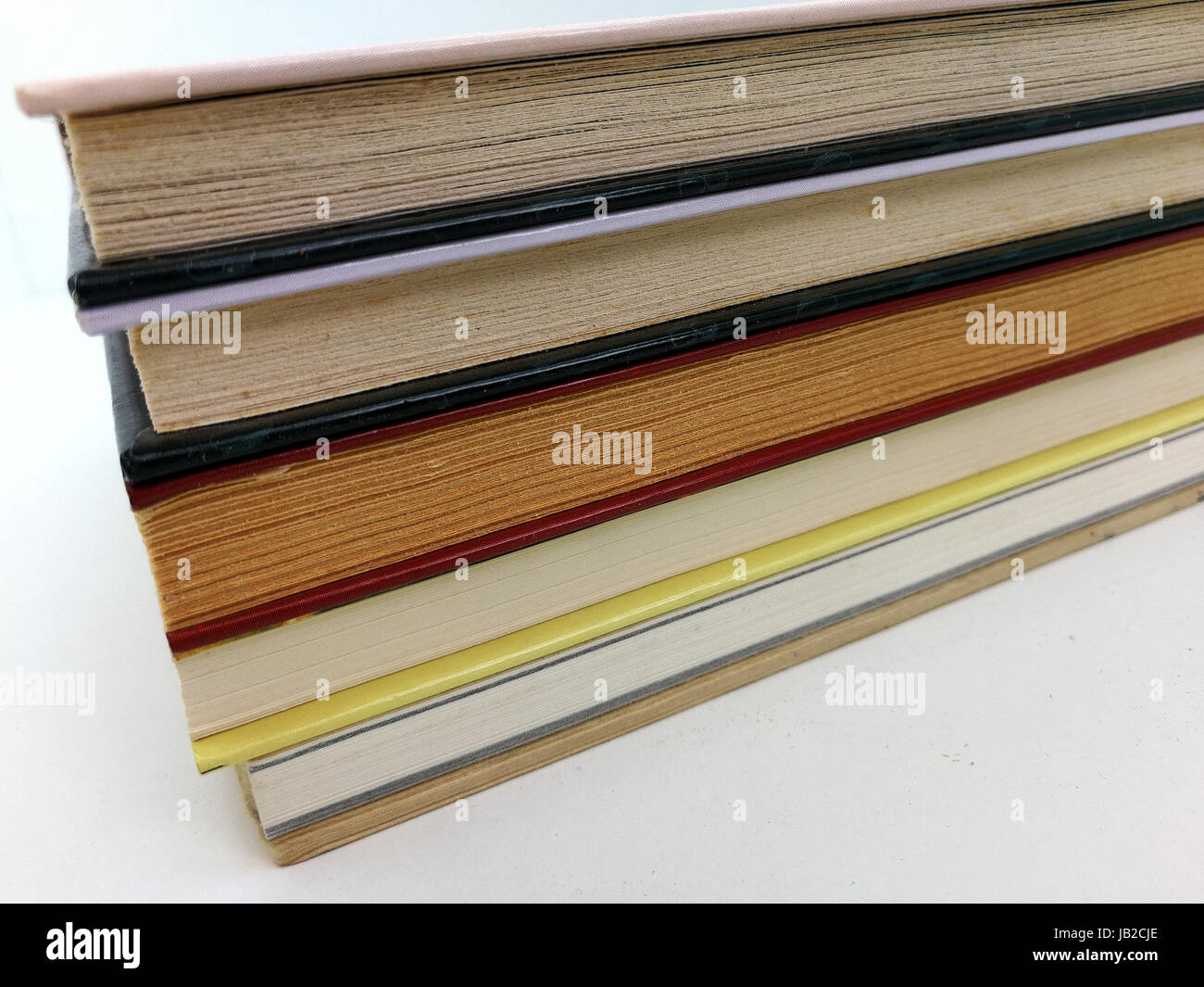 piled elegant books Stock Photo - Alamy