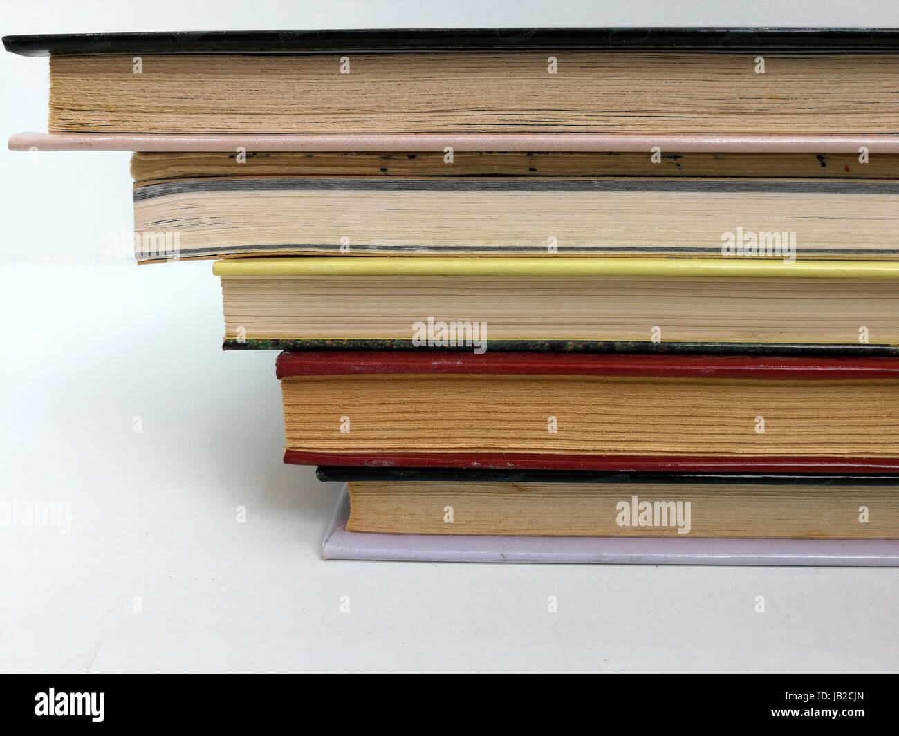 piled elegant books Stock Photo - Alamy