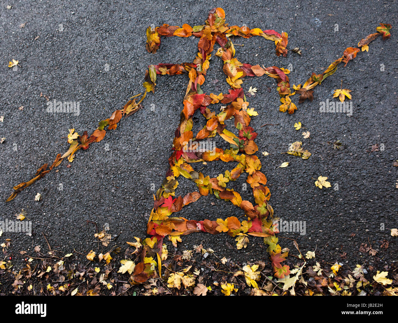 Electricity pylon symbols made from Autumn leaves Stock Photo - Alamy
