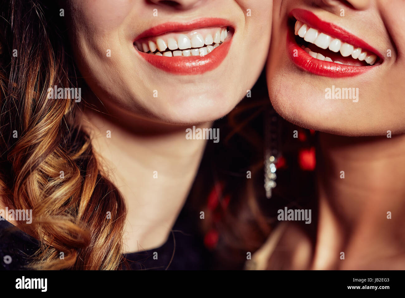 Dazzling Smiles of Young Women Stock Photo - Alamy