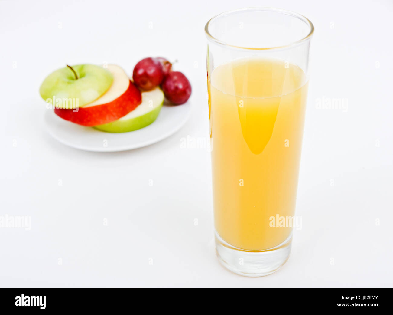 grapes, apples and orange juice. vegetarian appetizer Stock Photo - Alamy
