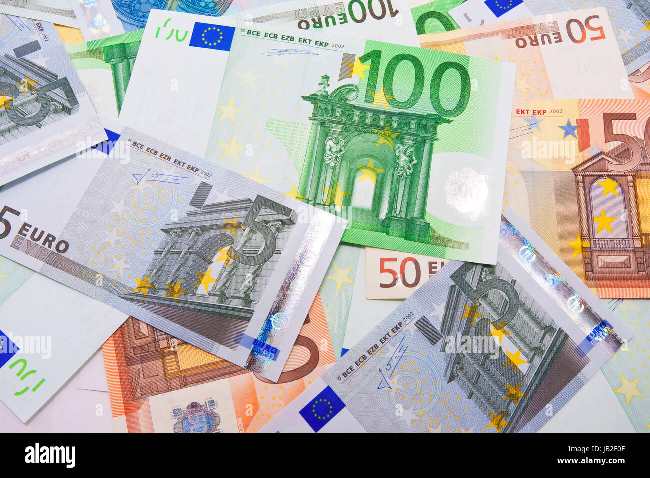 Many euro banknotes making european currency background Stock Photo - Alamy