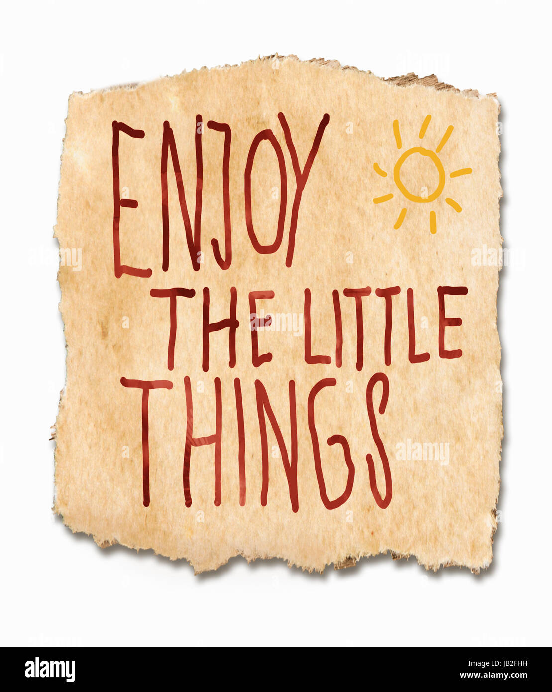 Enjoy the lttle things, an inspirational saying handwritten on a torn ...