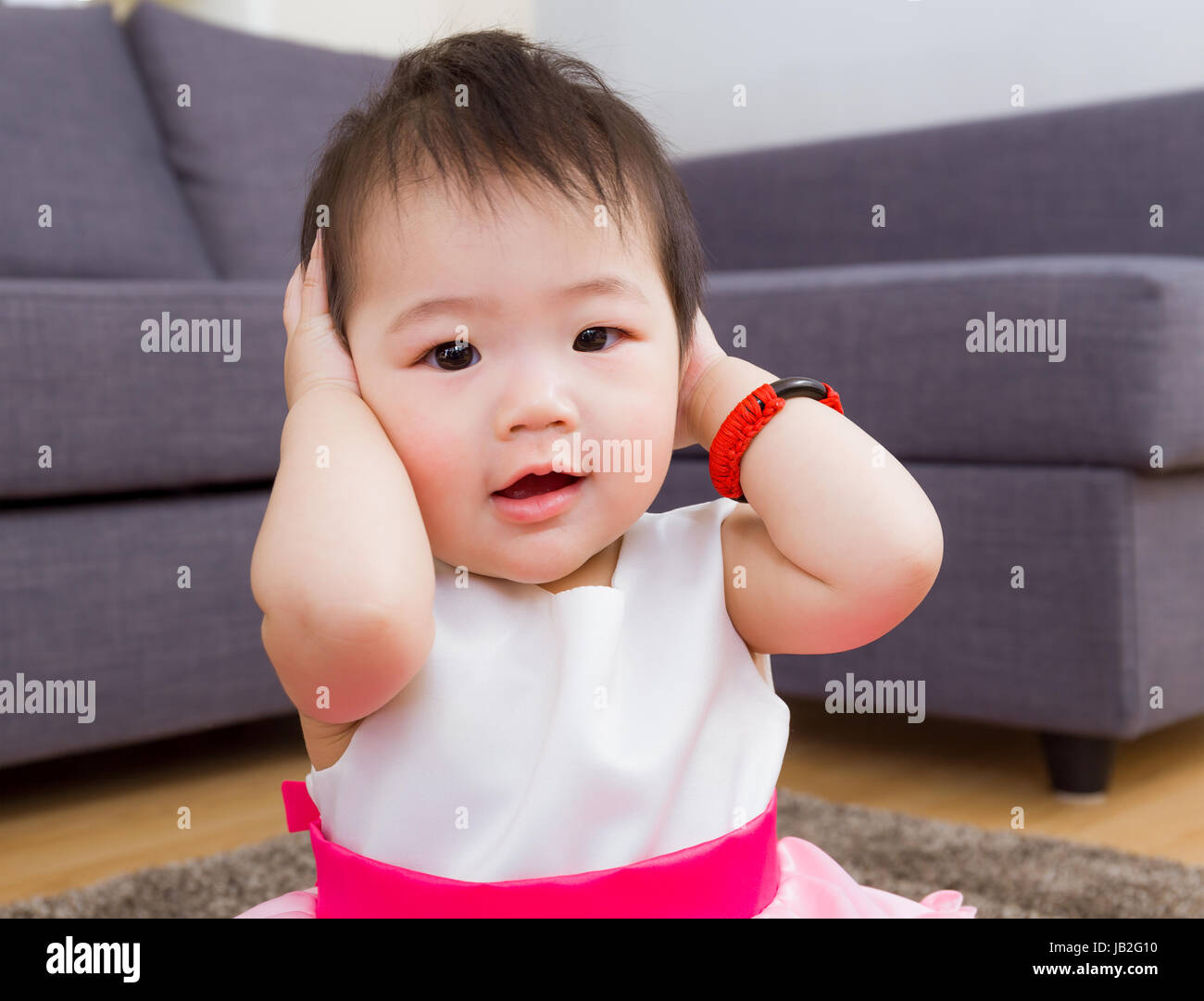 Little girl refuse to listen Stock Photo - Alamy
