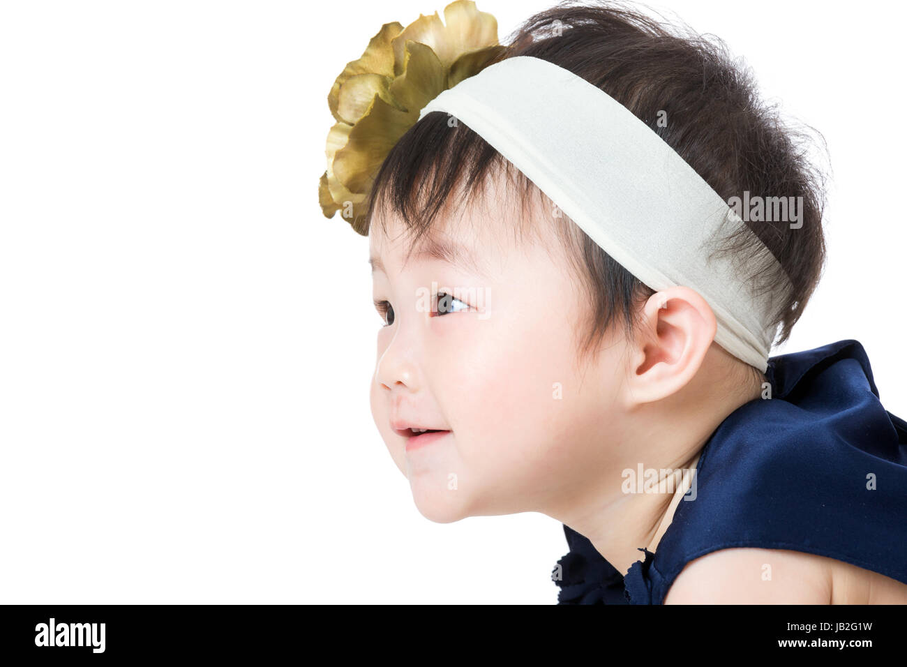 A side portrait of baby girl Stock Photo - Alamy