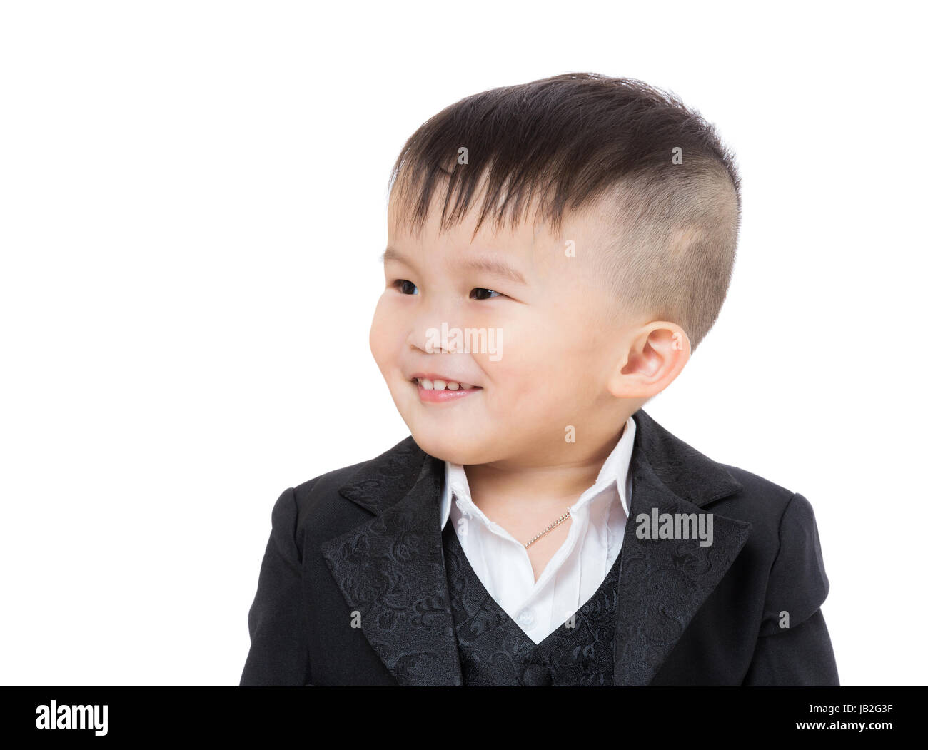 Asian kid looking at a side Stock Photo - Alamy