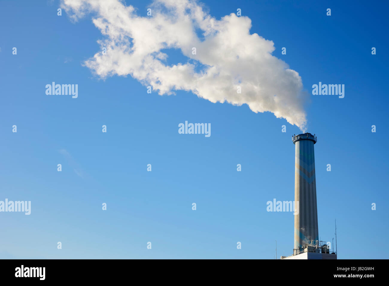 Smoke from a high smokestack Stock Photo - Alamy