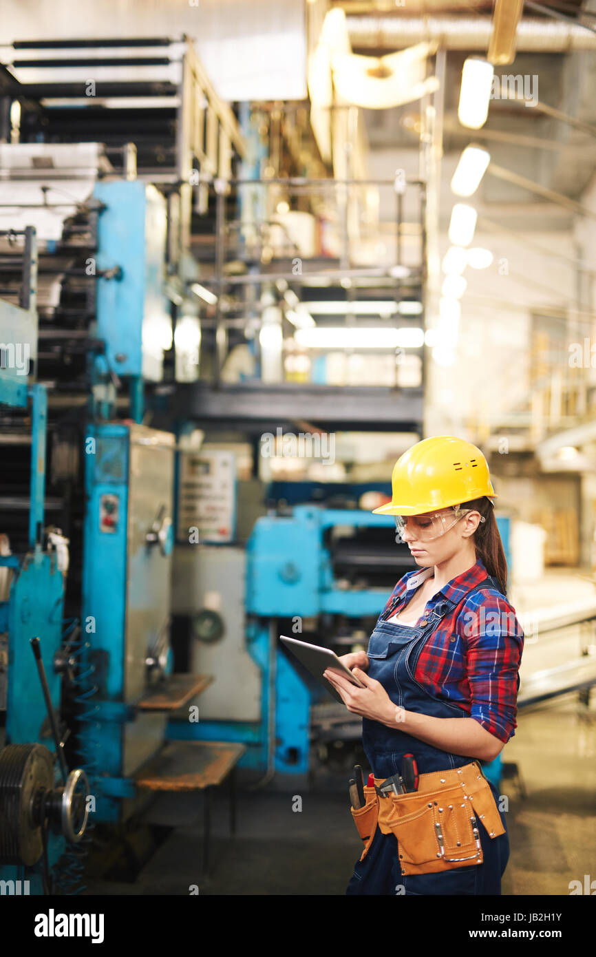 Quality Control Inspector with Digital Tablet Stock Photo - Alamy