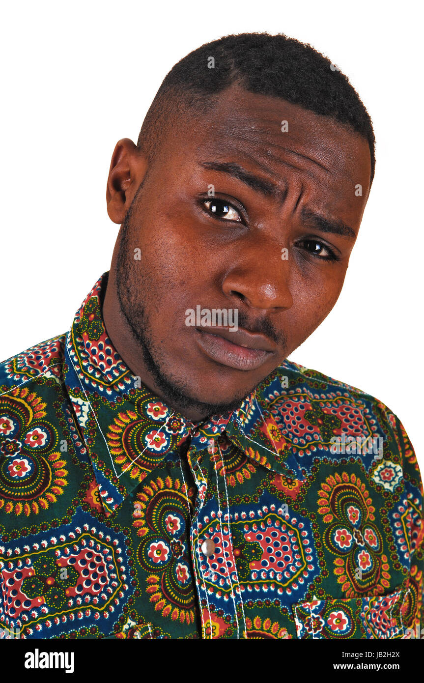 A portrait picture of a black young man standing for white background ...
