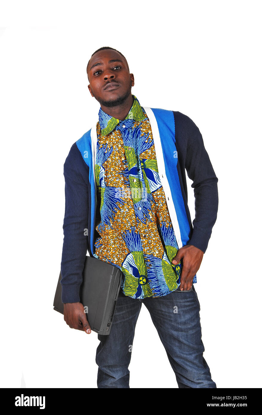 A handsome black man standing with his laptop, for white background ...