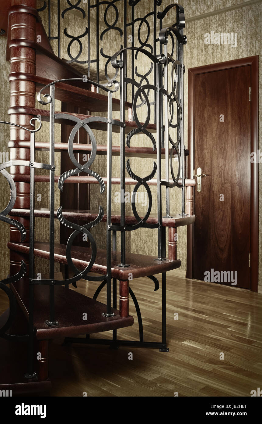 Spiral Staircase With Metal Railing In The Entrance Hall Stock Photo ...