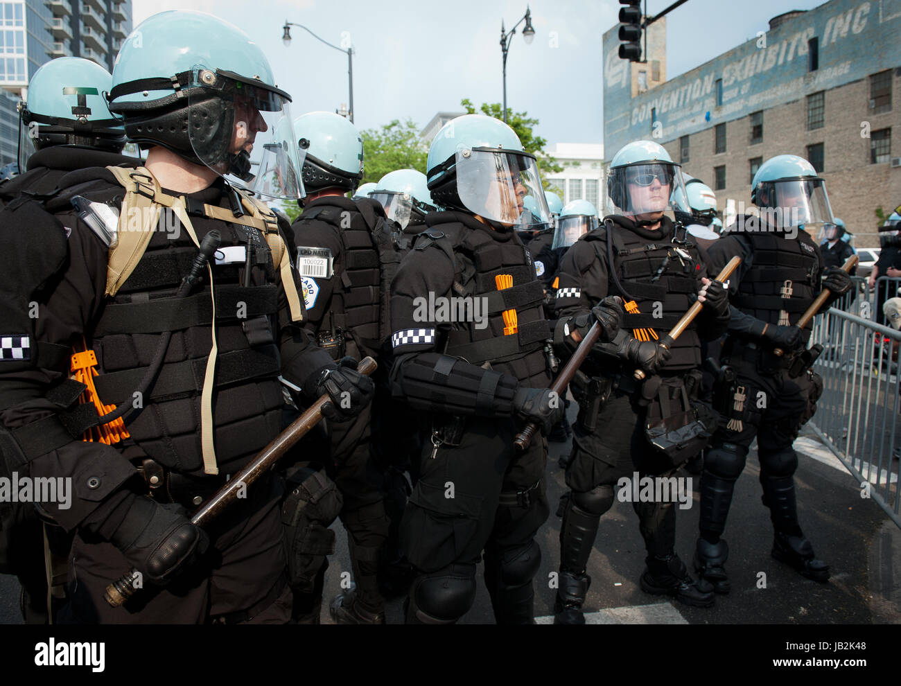Police in body armor formed lines to herd people out of the area Stock ...