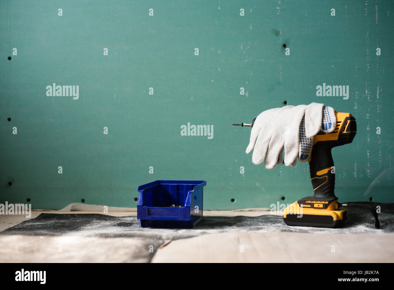interior house alterations works Drywall Construction worker holding ...