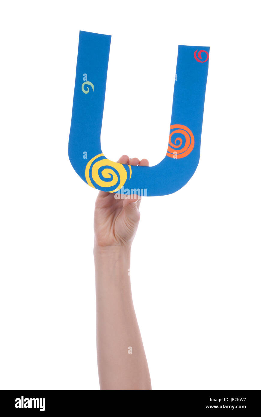 A Hand Holding a Colorful U, Isolated Stock Photo - Alamy