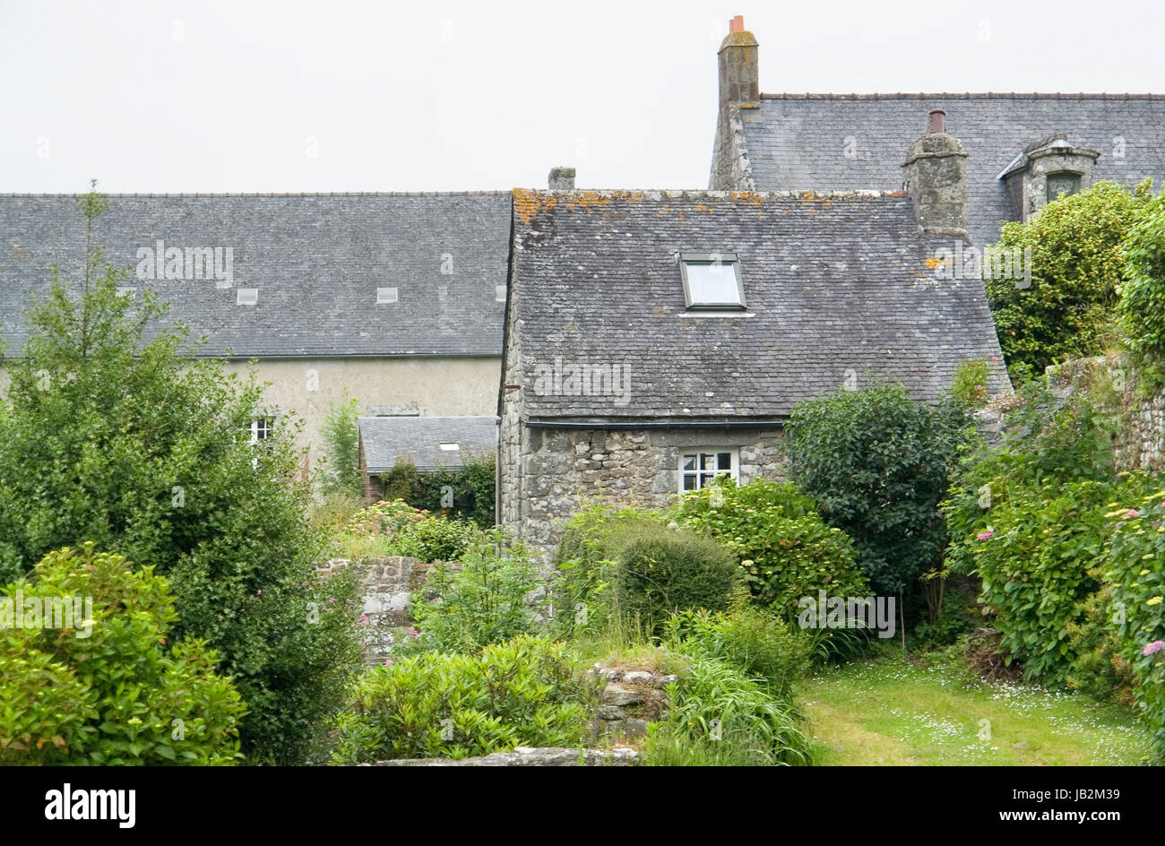 houses in Locronan, a idyllic medieval village in Brittany, France ...