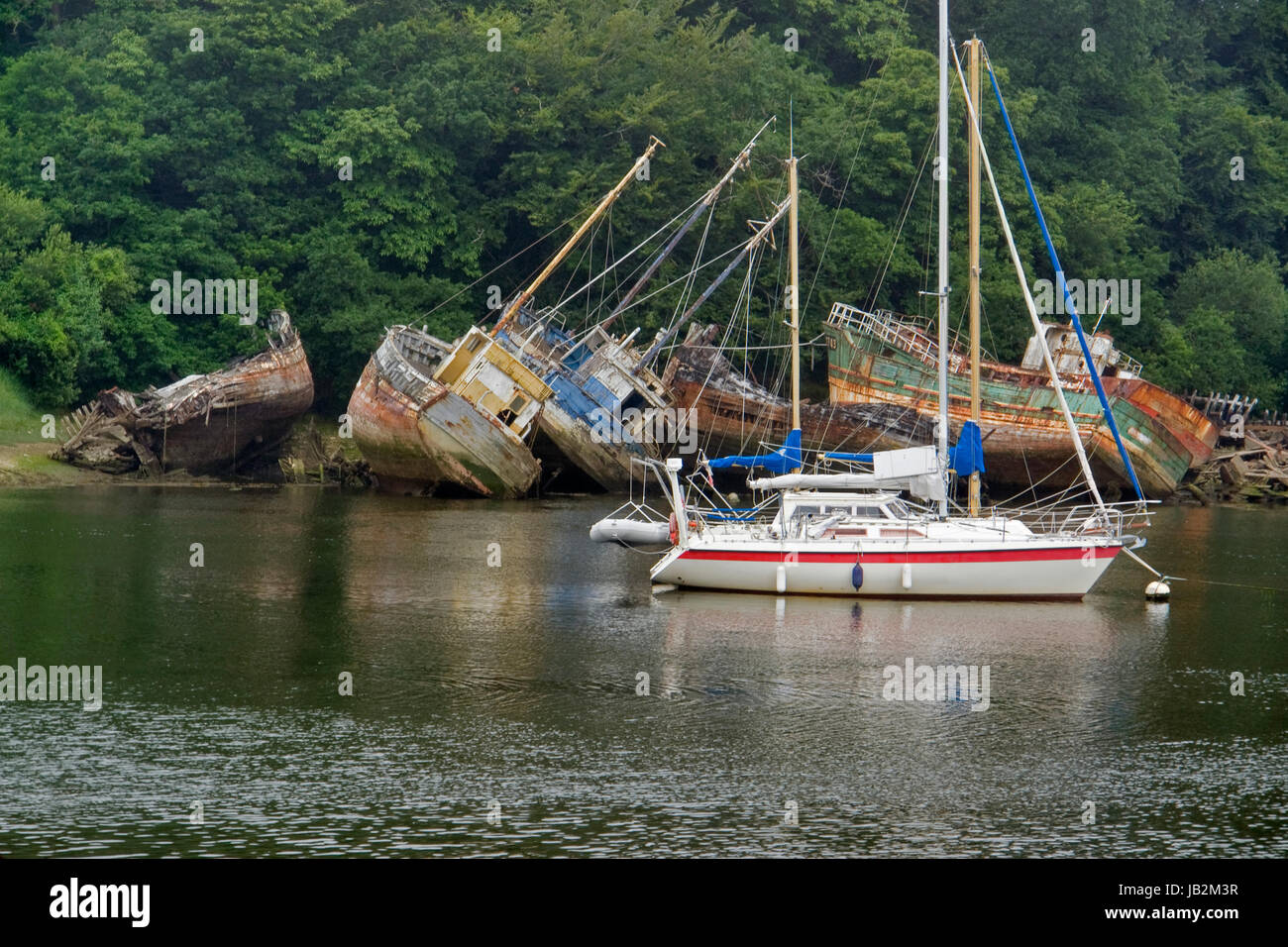 shipwrecks and boat on a river in Brittany, France Stock Photo - Alamy