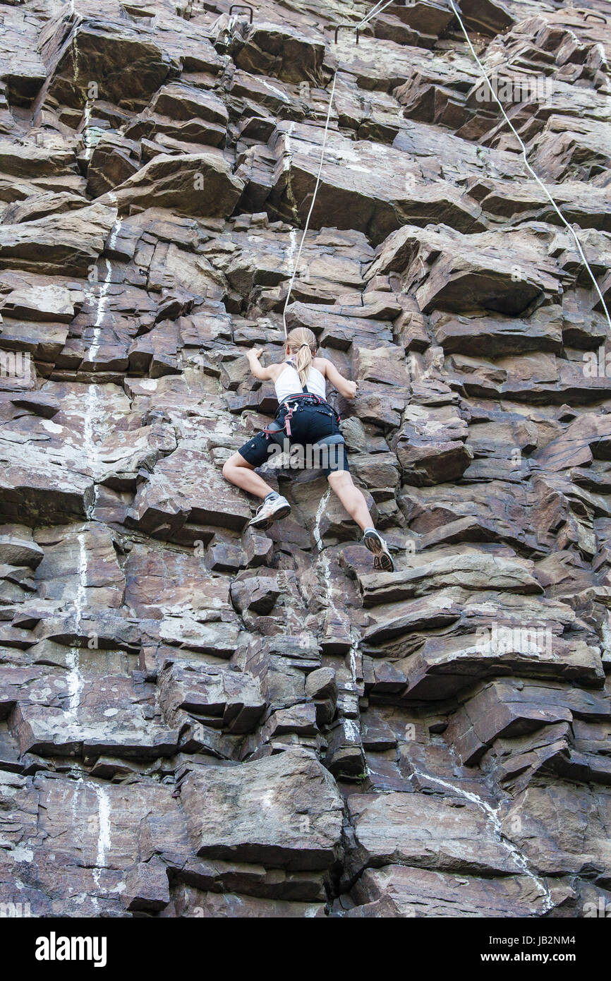 Extreme rock climber reaching for the summit Stock Photo - Alamy