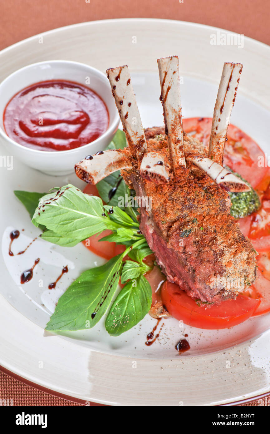 roasted lamb rib chops with vegetables Stock Photo - Alamy