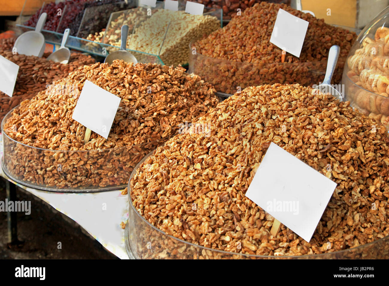 Healthy snack street market stall with mixed nuts Stock Photo - Alamy