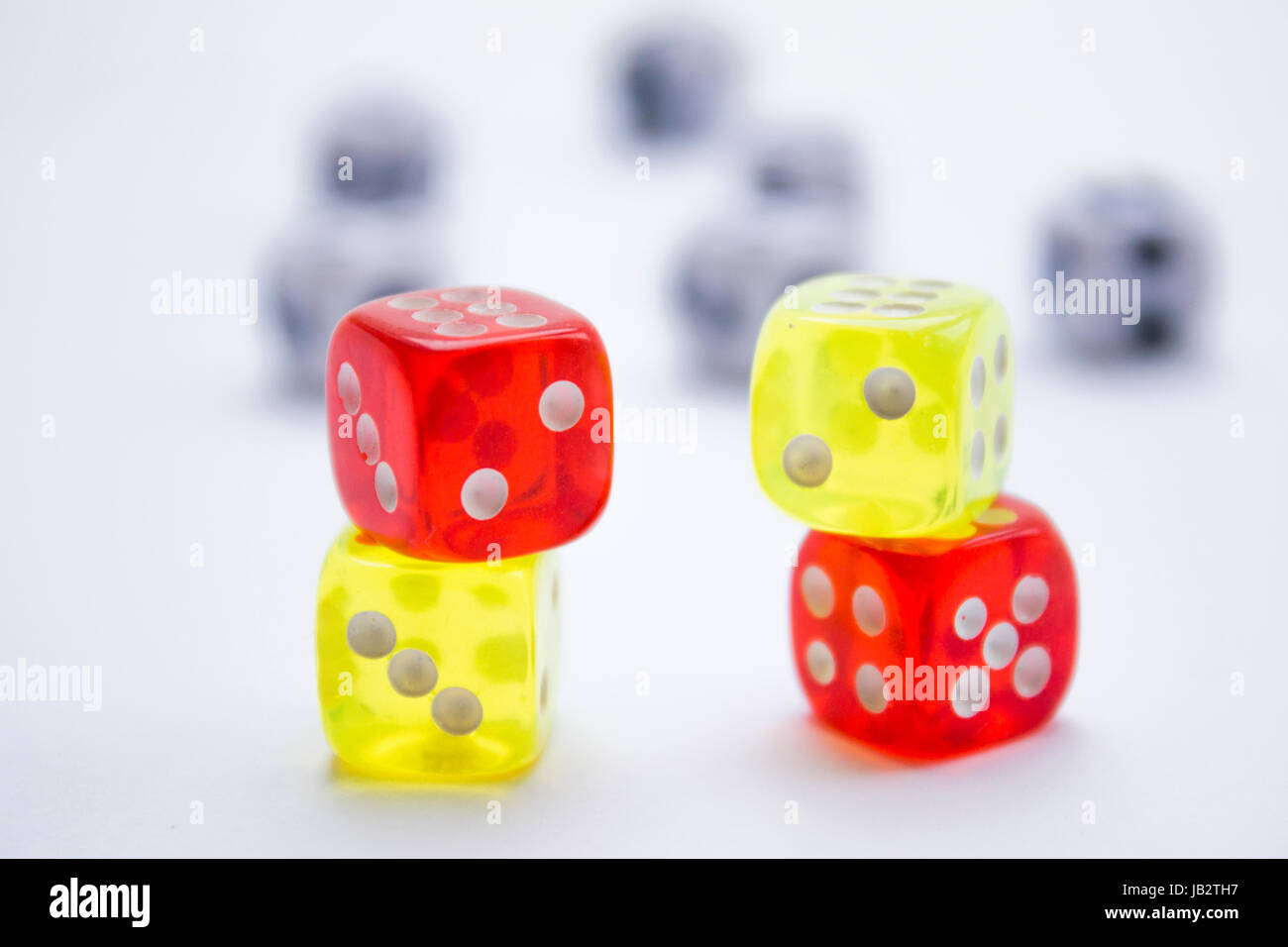 Composition from different colored dice on a white background Stock ...