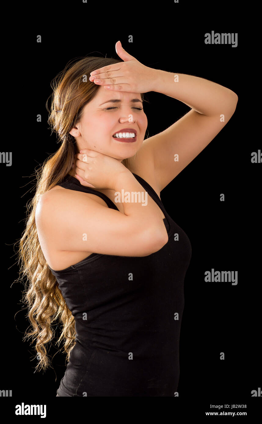 Beautiful young lady Suffer crick after workout with a hand in her ...