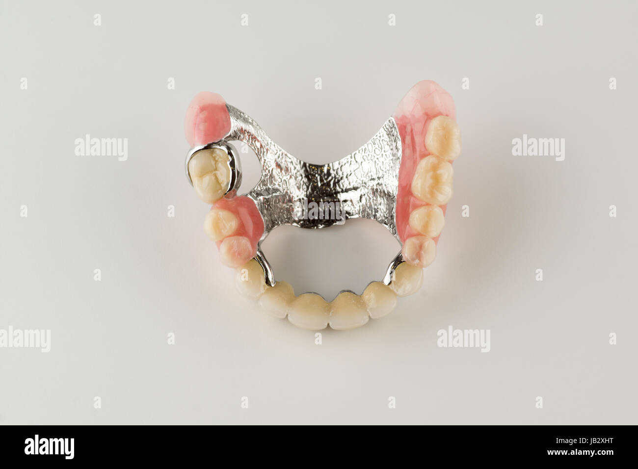 Clasp prosthesis with lock fixation on a white background Stock Photo ...