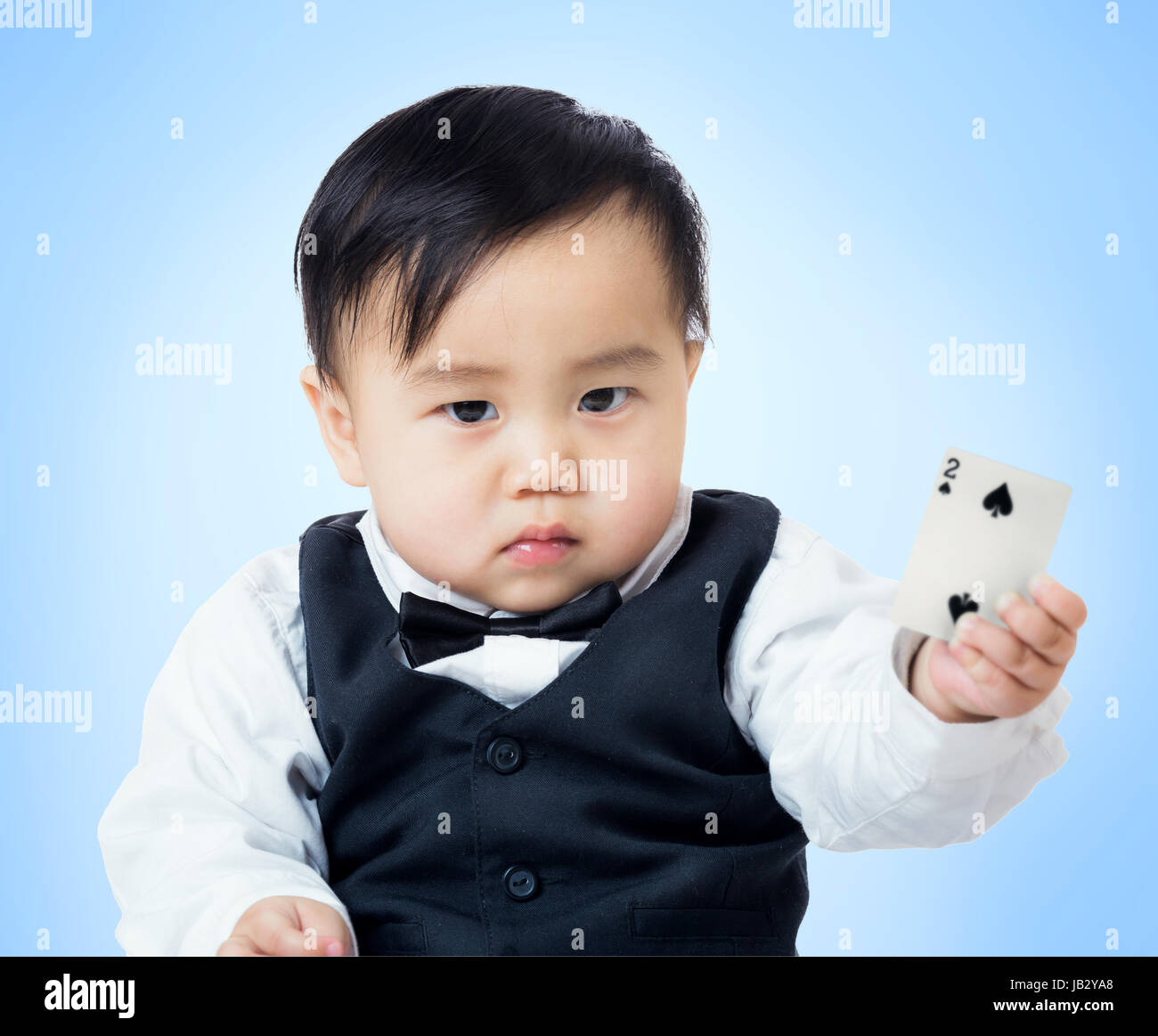 Baby boy with poker card Stock Photo - Alamy
