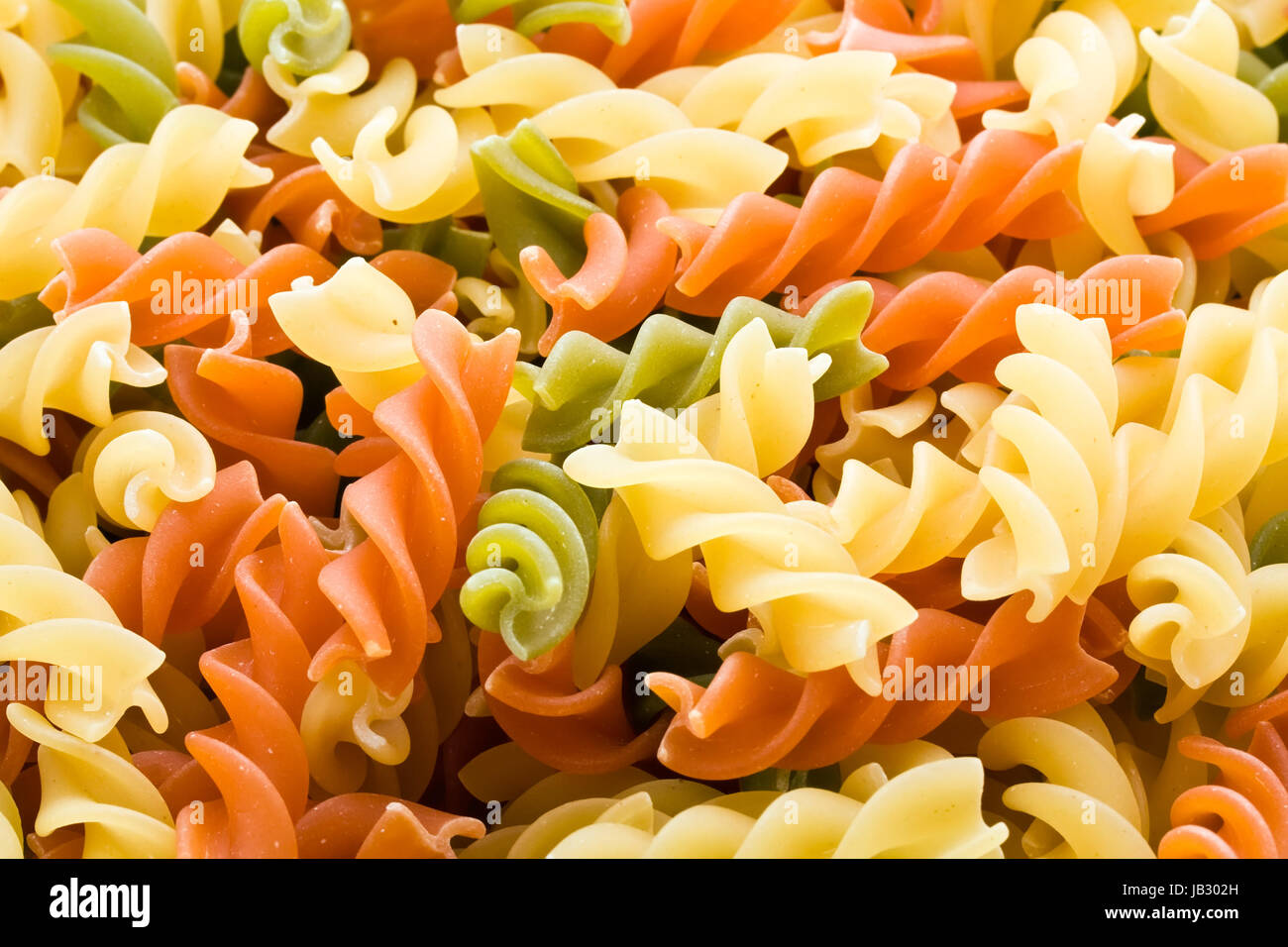 Raw italian pasta isolated on white background Stock Photo - Alamy