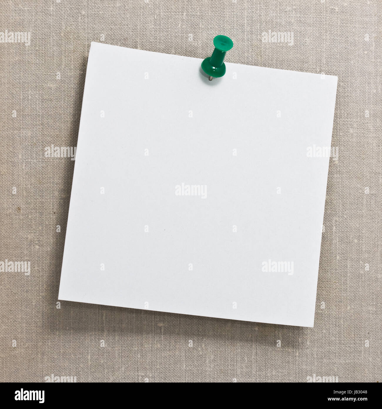 Note white paper tacked on a wall Stock Photo - Alamy