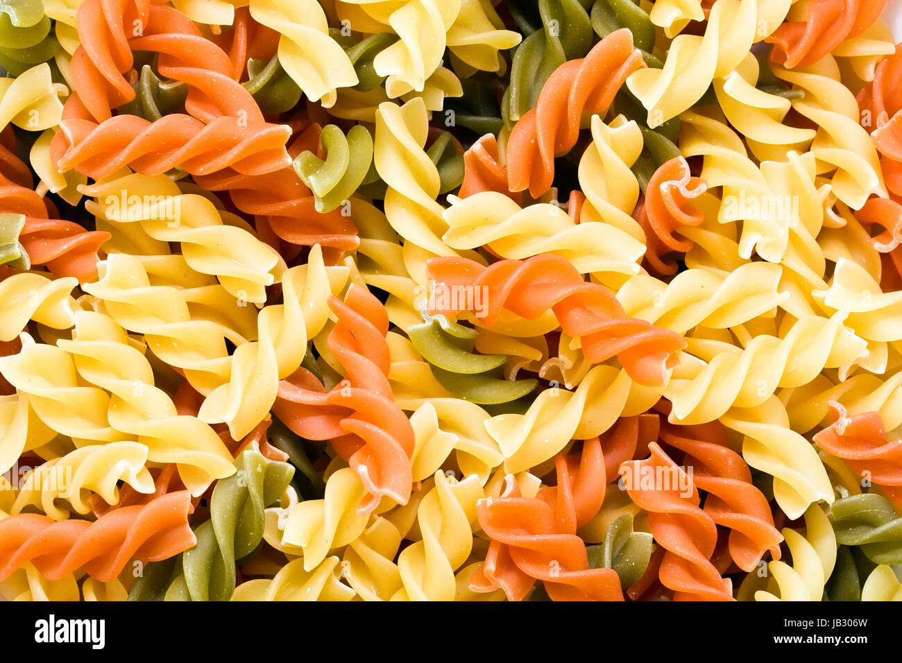 Raw italian pasta isolated on white background Stock Photo - Alamy