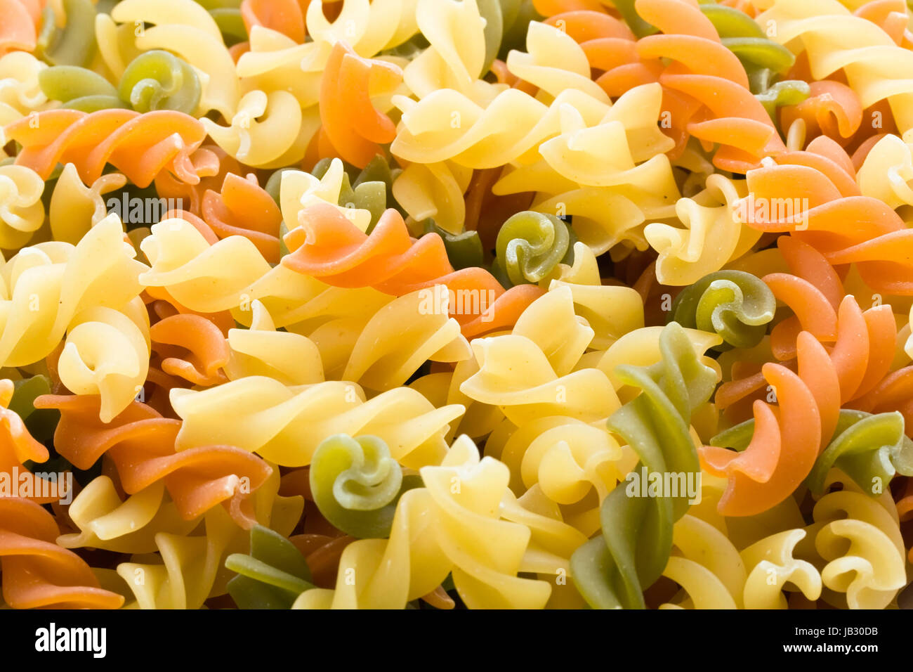 Raw italian pasta isolated on white background Stock Photo - Alamy