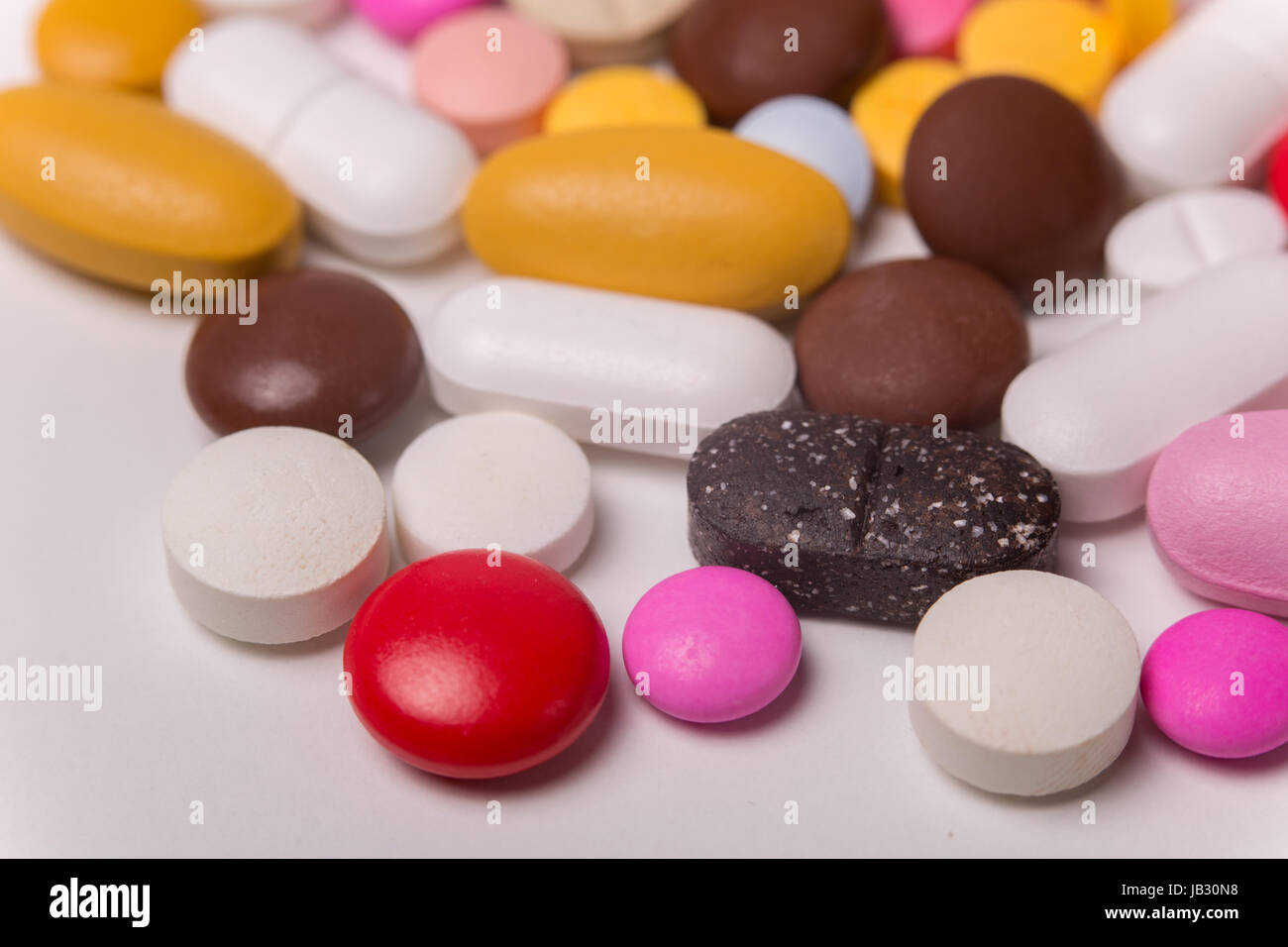 different Tablets pills capsule heap mix therapy drugs Stock Photo - Alamy