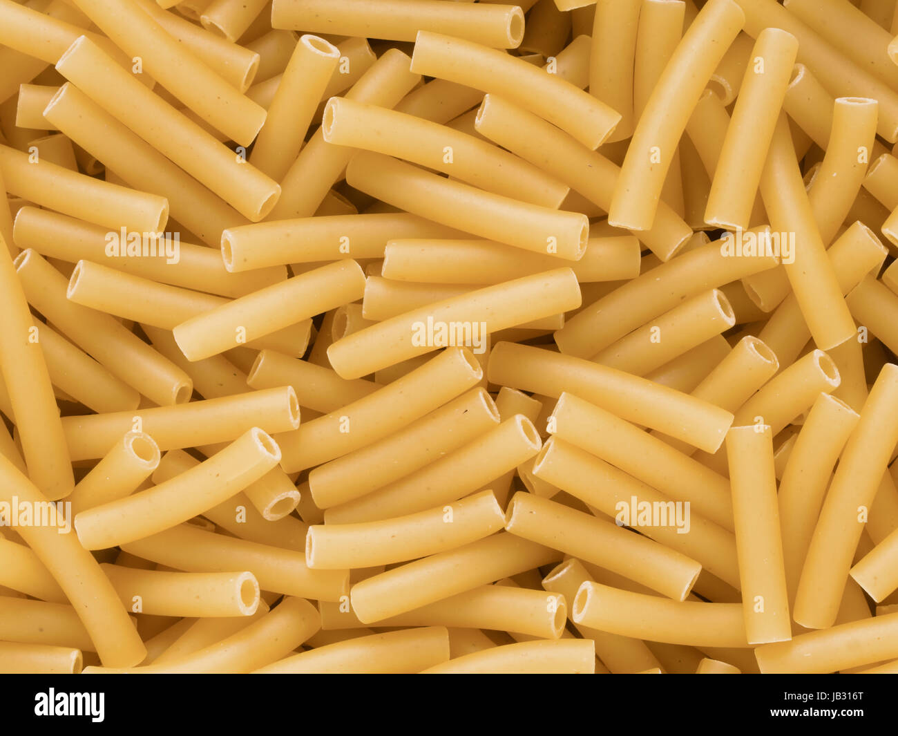 close up of macaroni pasta tubes food background Stock Photo - Alamy