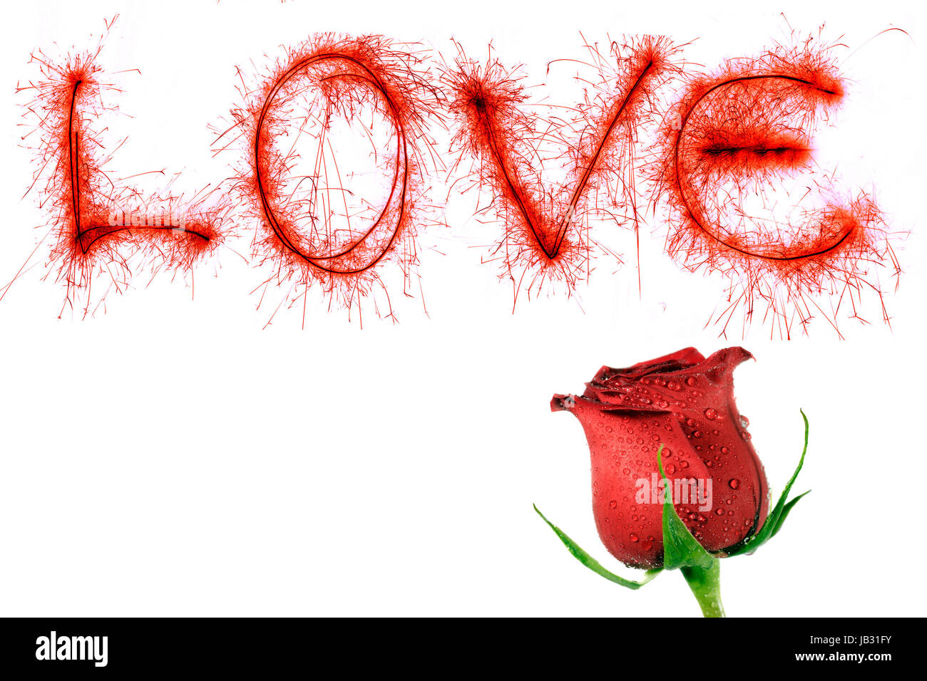Love sign made by sparkler with red rose isolated on white background ...