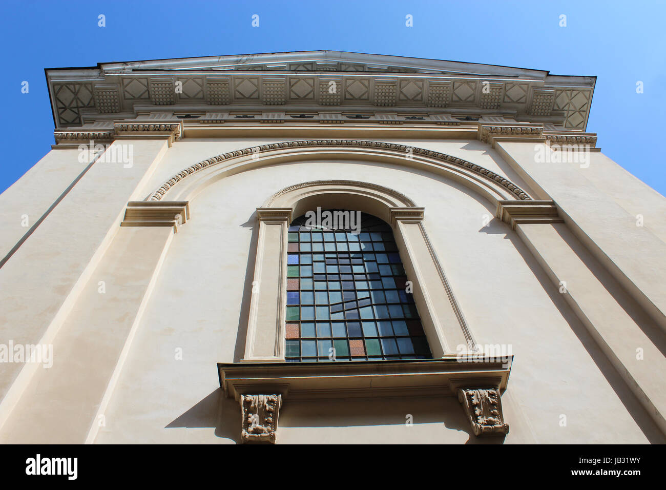 White wall of an architectural ensemble in Catholic church Stock Photo ...